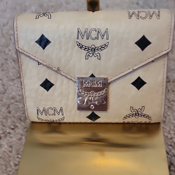 MCM | Bags | Rehab Mcm Cream And Black Wallet Please Read Description ...